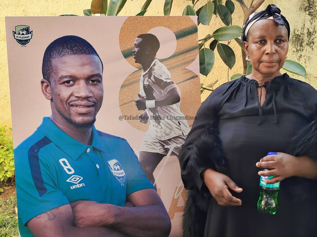 PICTURE: Grieving Brian Banda’s mother next to her son’s portrait at ...